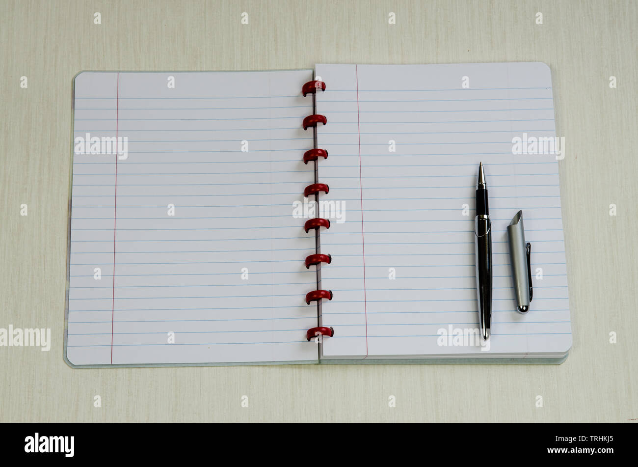open blank paper notepad with pen concept Stock Photo - Alamy