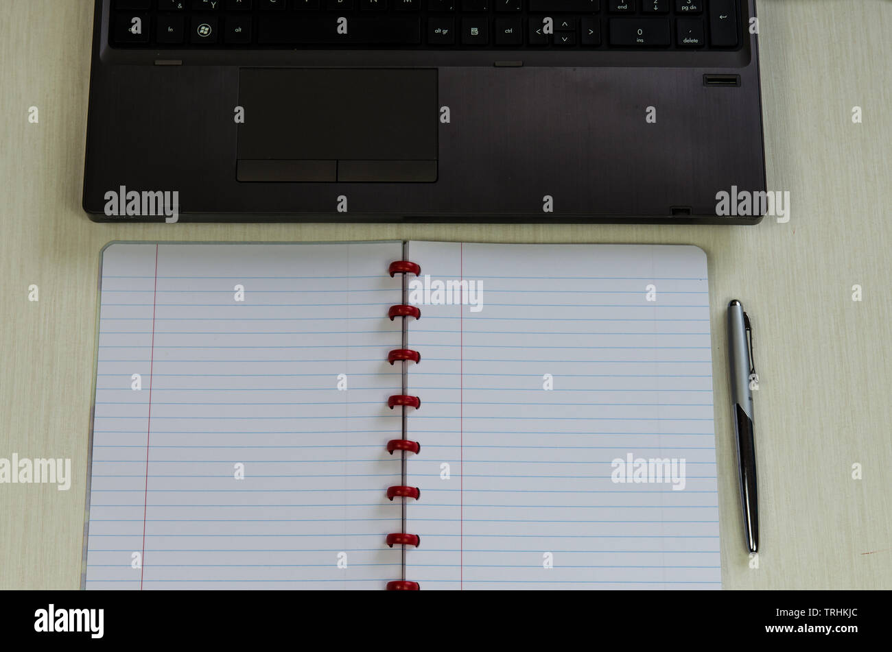 open blank paper notepad with pen and laptop concept Stock Photo - Alamy