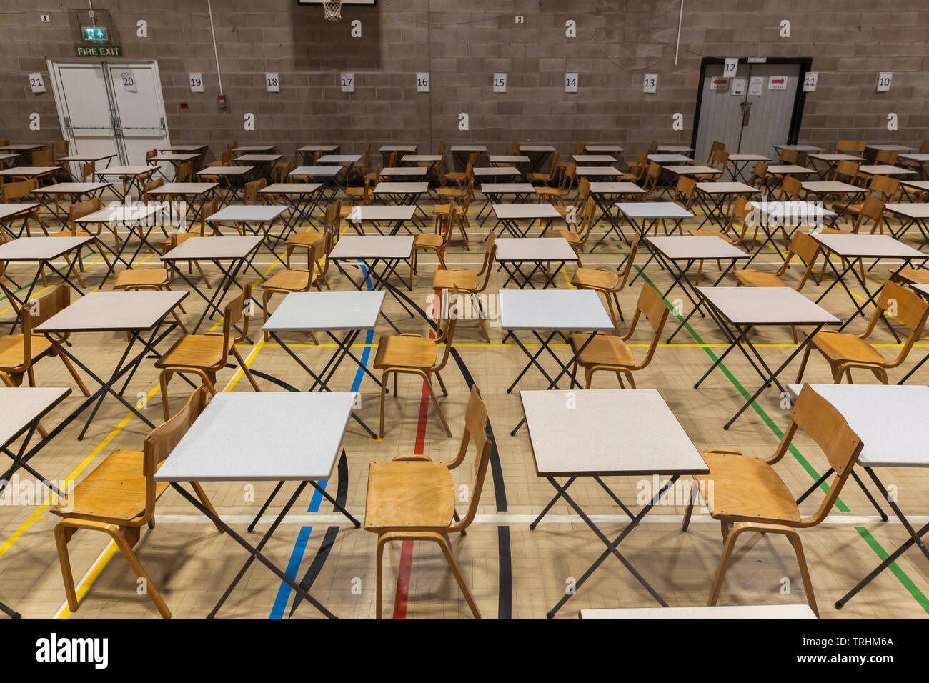 Exam tables and chairs set up in a UK school Stock Photo - Alamy