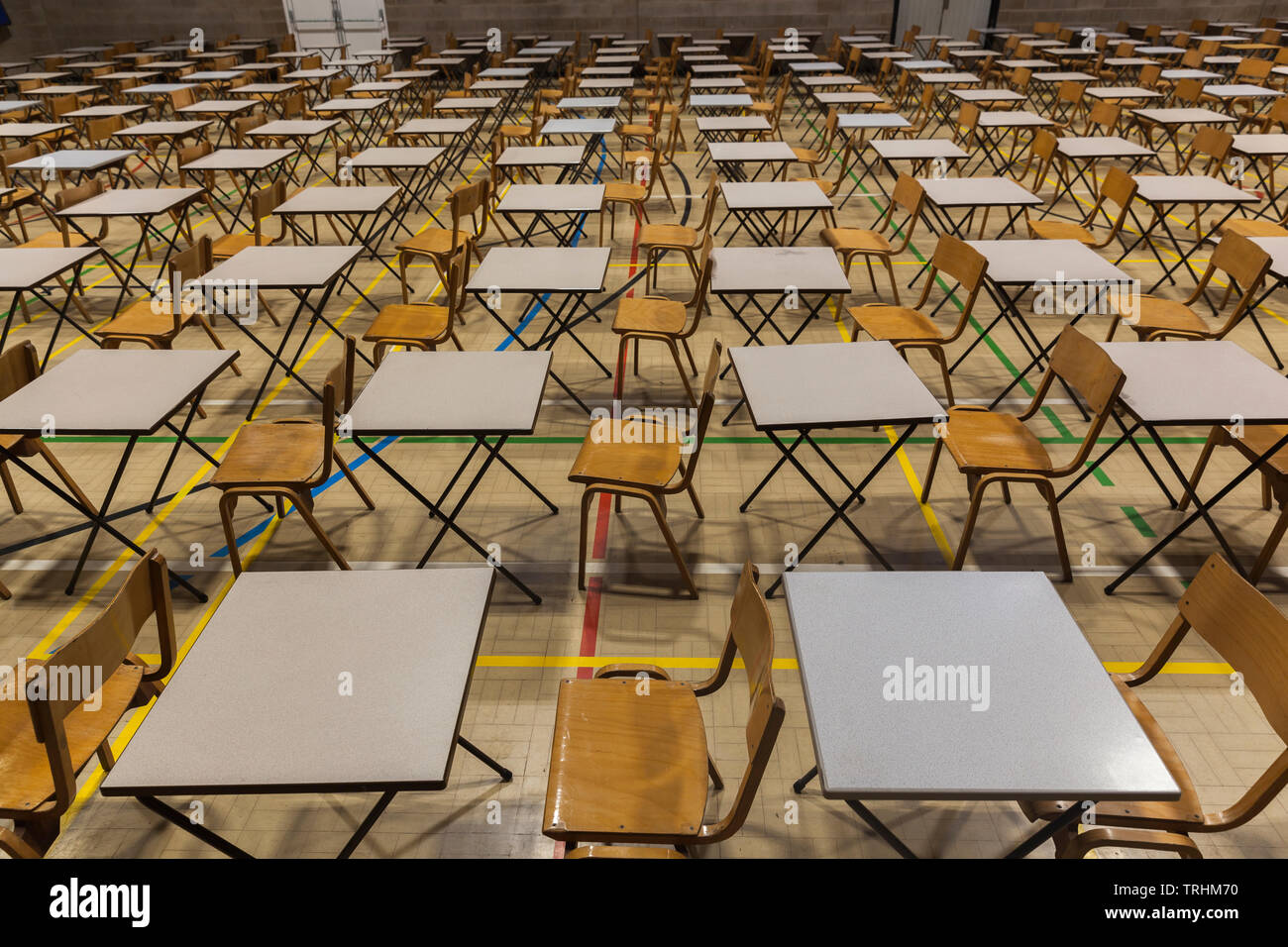 Exam tables and chairs set up in a UK school Stock Photo - Alamy
