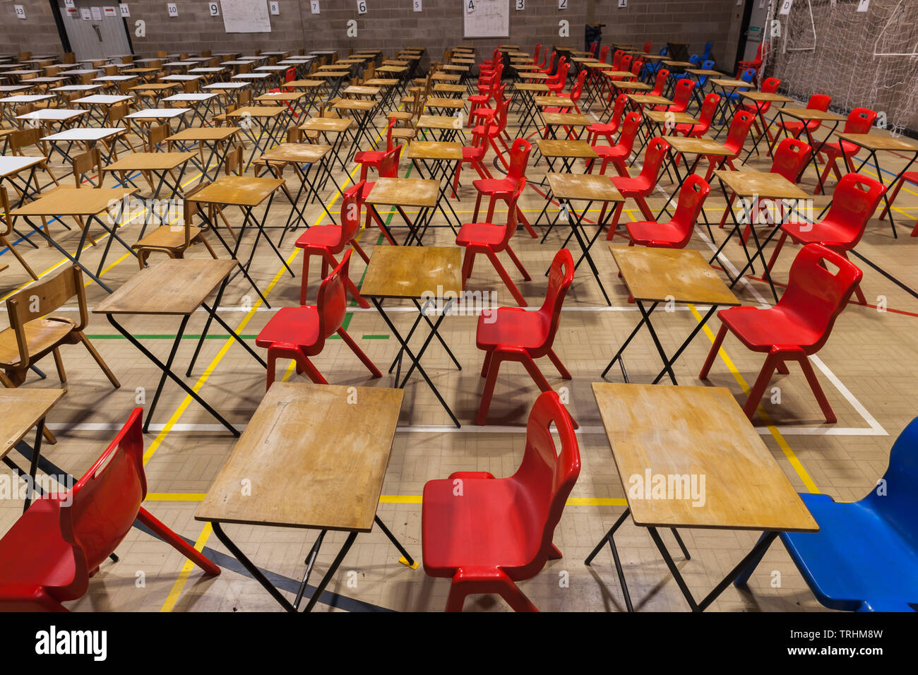 Exam tables and chairs set up in a UK school Stock Photo - Alamy