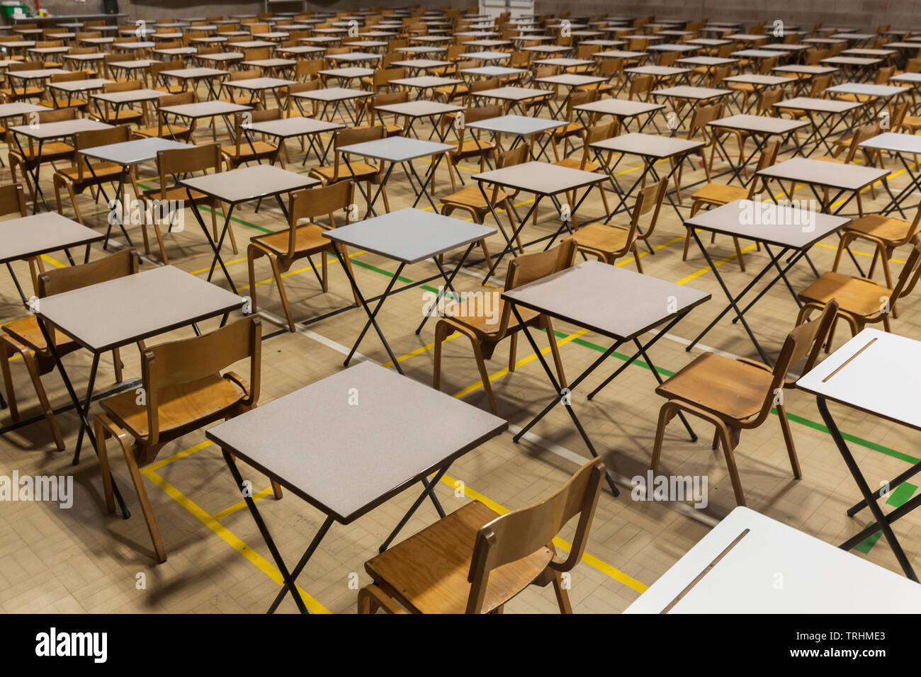Exam tables and chairs set up in a UK school Stock Photo - Alamy