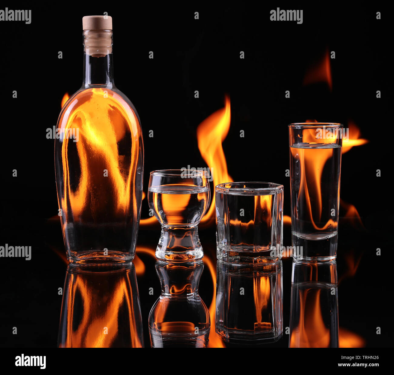 Stack of tequila on fire Stock Photo - Alamy