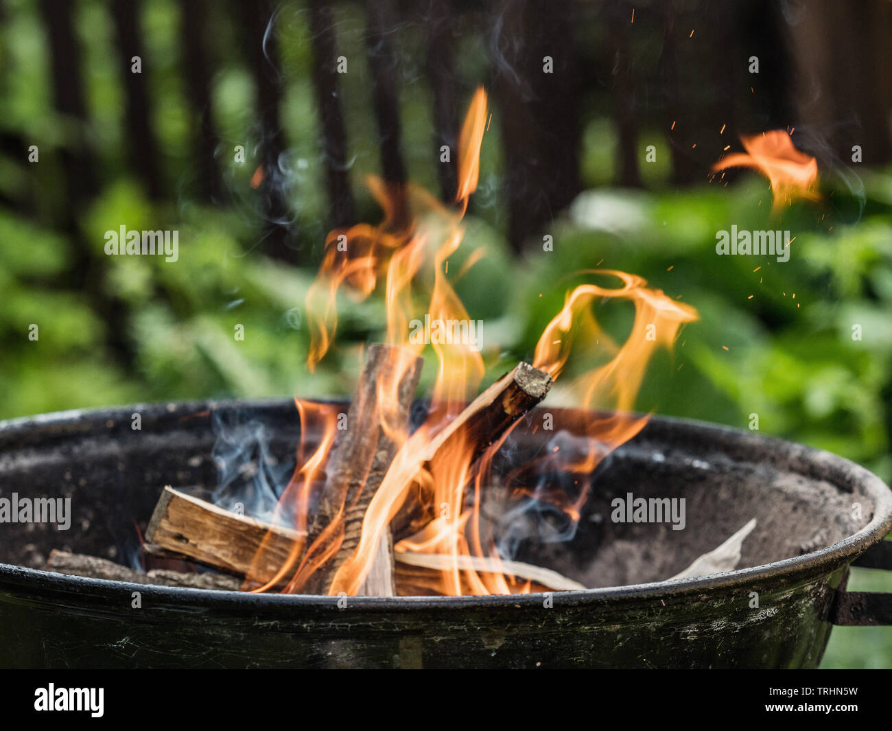 Barbecue grill with fire on nature, outdoor, close up. Empty Grill With ...