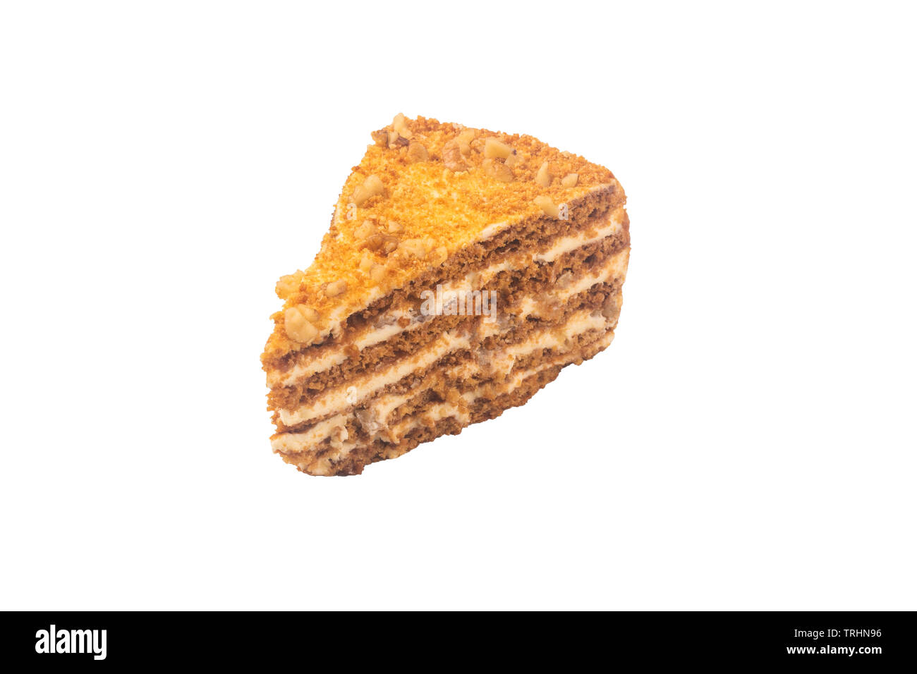 Slice of layered honey cake isolated on white background Stock Photo ...