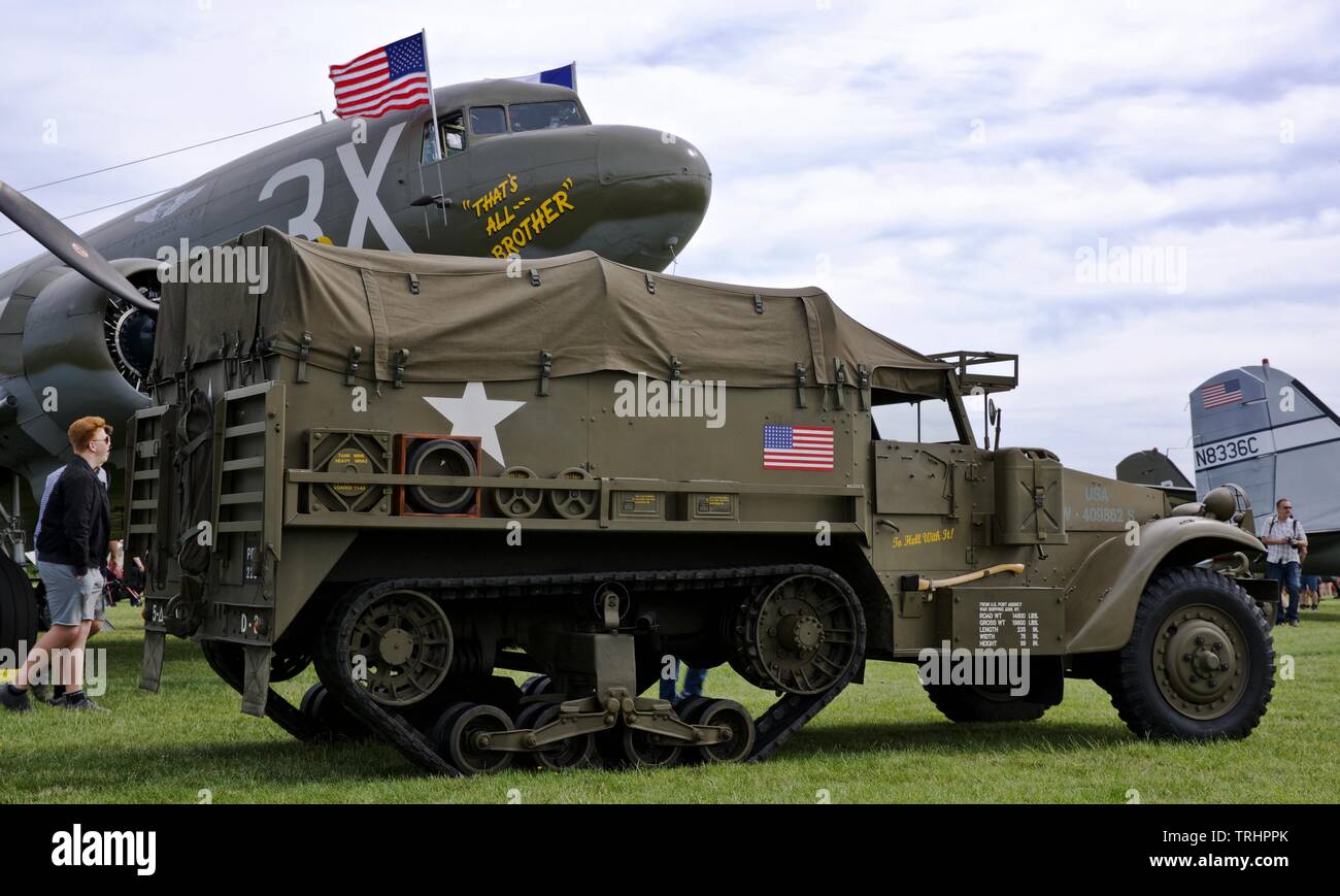 M3 Half-Track armoured vehicle with a C-47 “That’s all Brother” at the ...