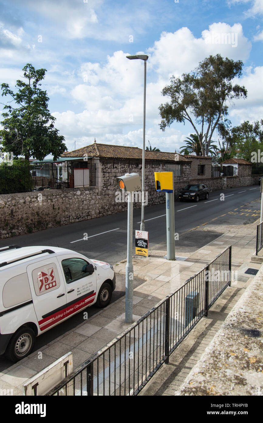 Speed Camera in Gibraltar sign light van railings trees metal outside ...