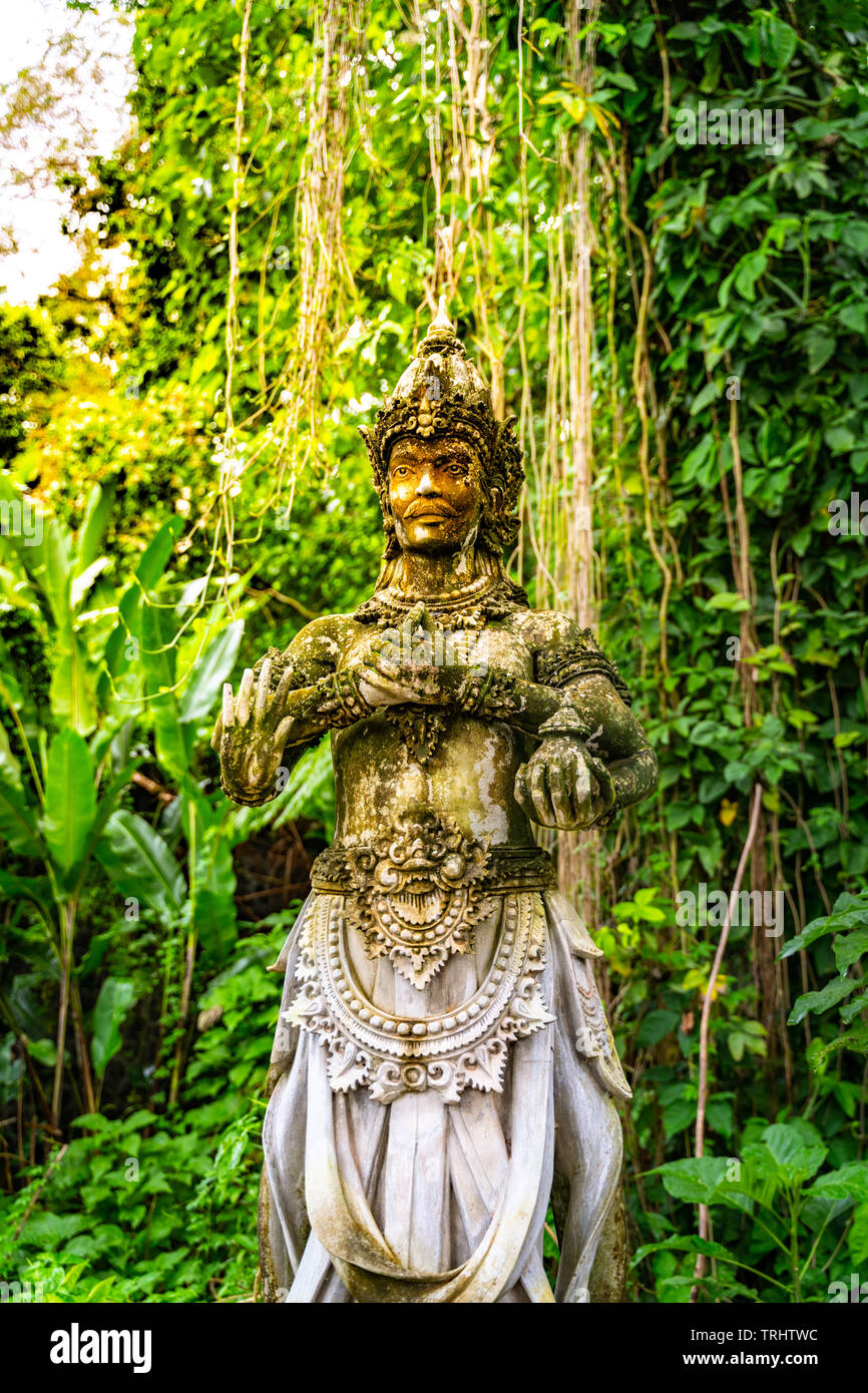 Traditional Balinese Hindu God statue in the garden setup Stock Photo ...