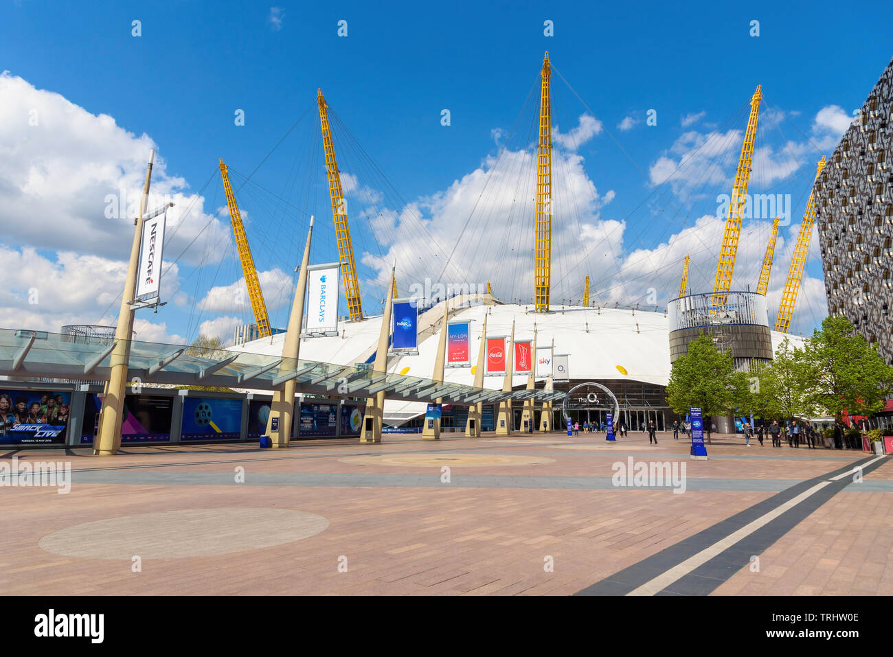 London, UK - May 1, 2018: People walk on Peninsula Square in front of ...