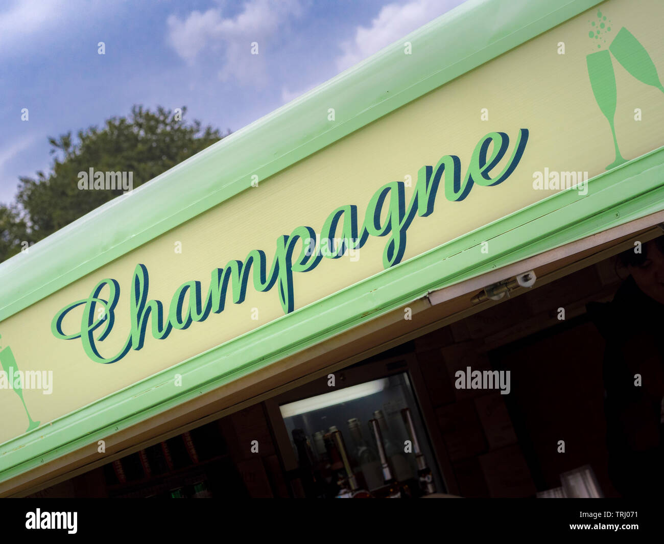 Champagne sign on mobile bar at outdoor event Stock Photo - Alamy