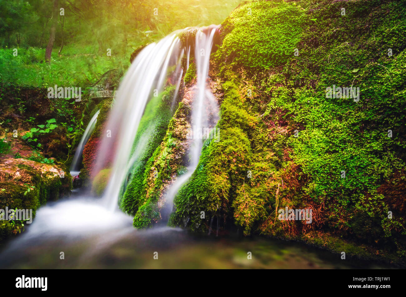 Colorful waterfall slow exposure Stock Photo - Alamy