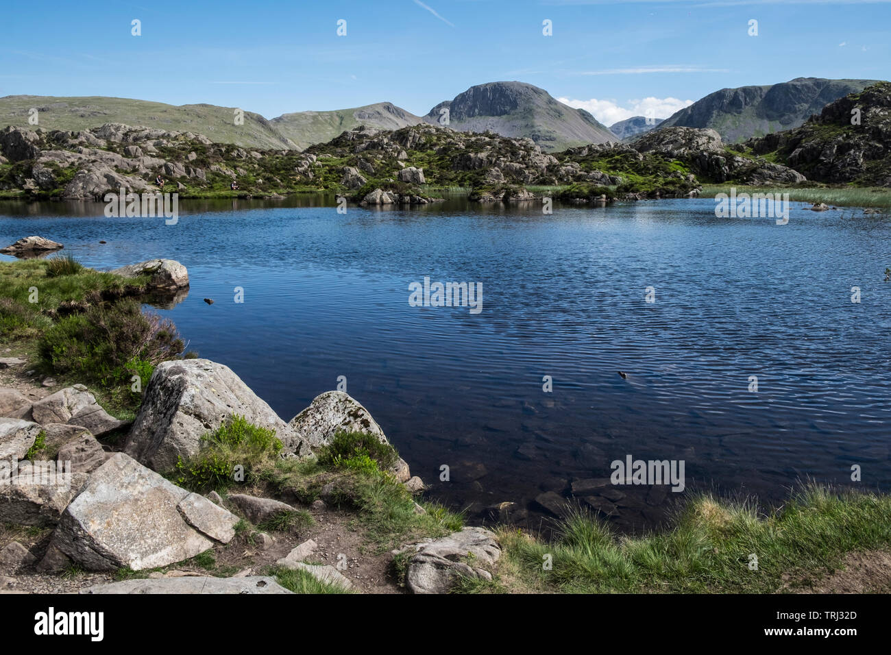 Inomimate Tarn on a sunny day, Haystacks mountain, Cumbria. The final ...