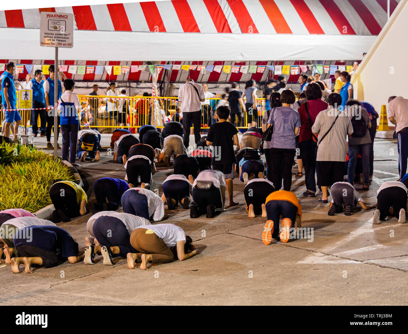 SINGAPORE, 18 MAY 2019 - Devotees perform the three steps one bow ...