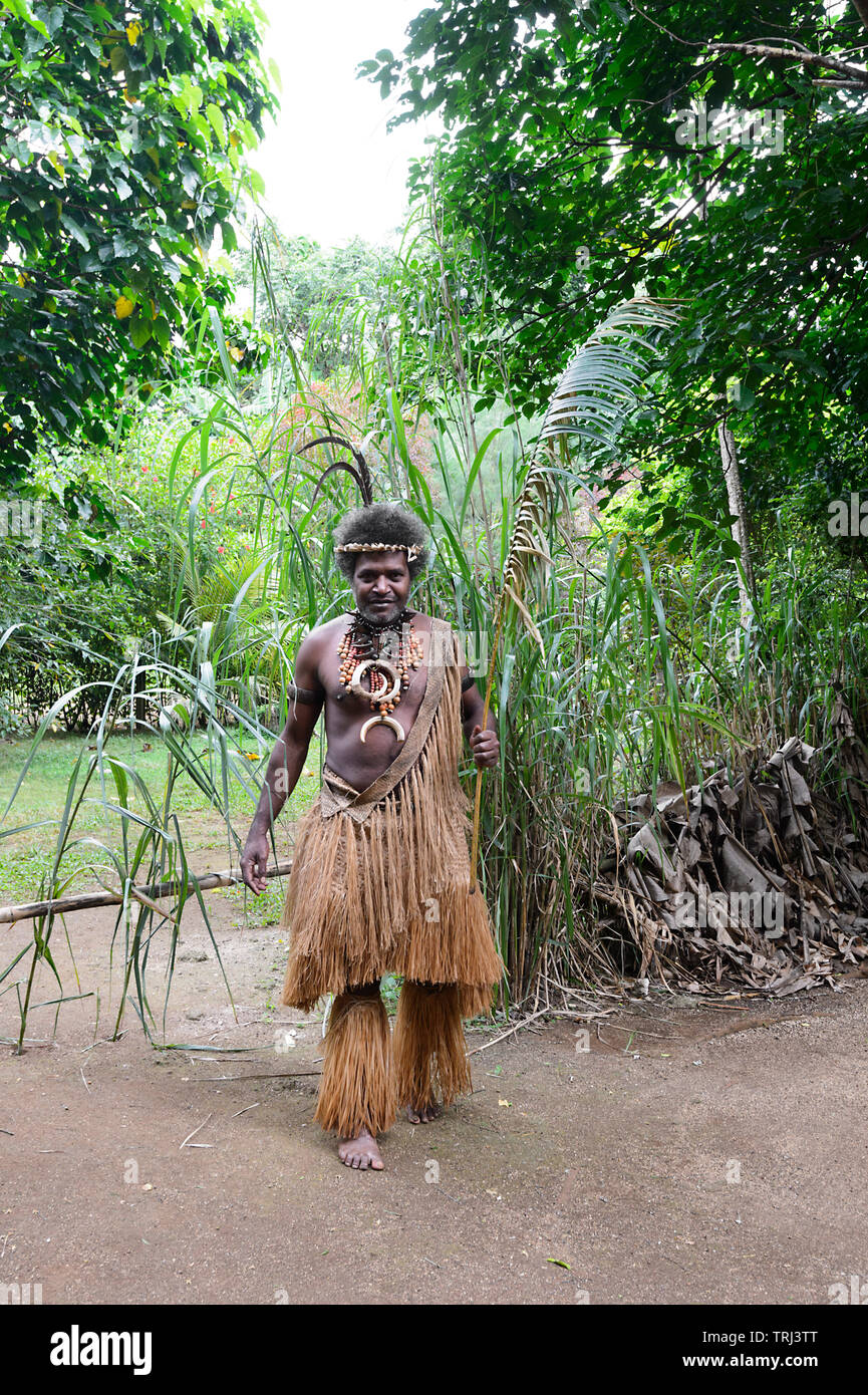 Tribal man wearing traditional costume, Pepeyo Cultural Village, Port ...