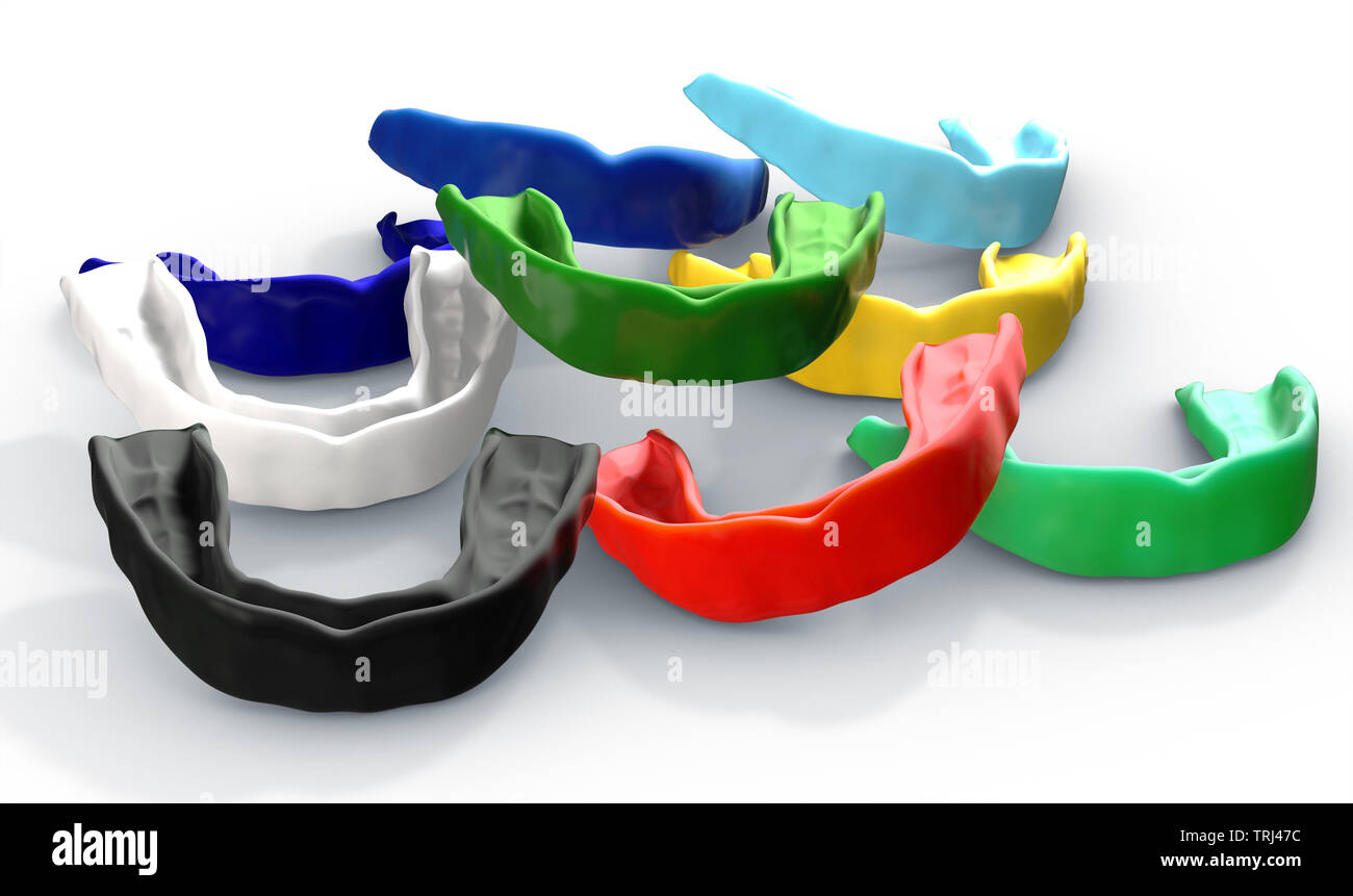 A collection of colorful regular moulded sports gum guards on an ...