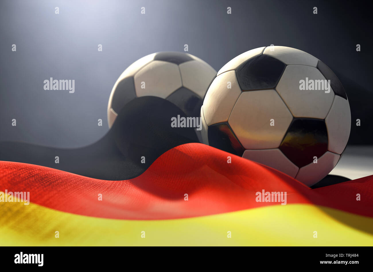 Two regular stitched panel soccer balls resting on a draped Germany ...