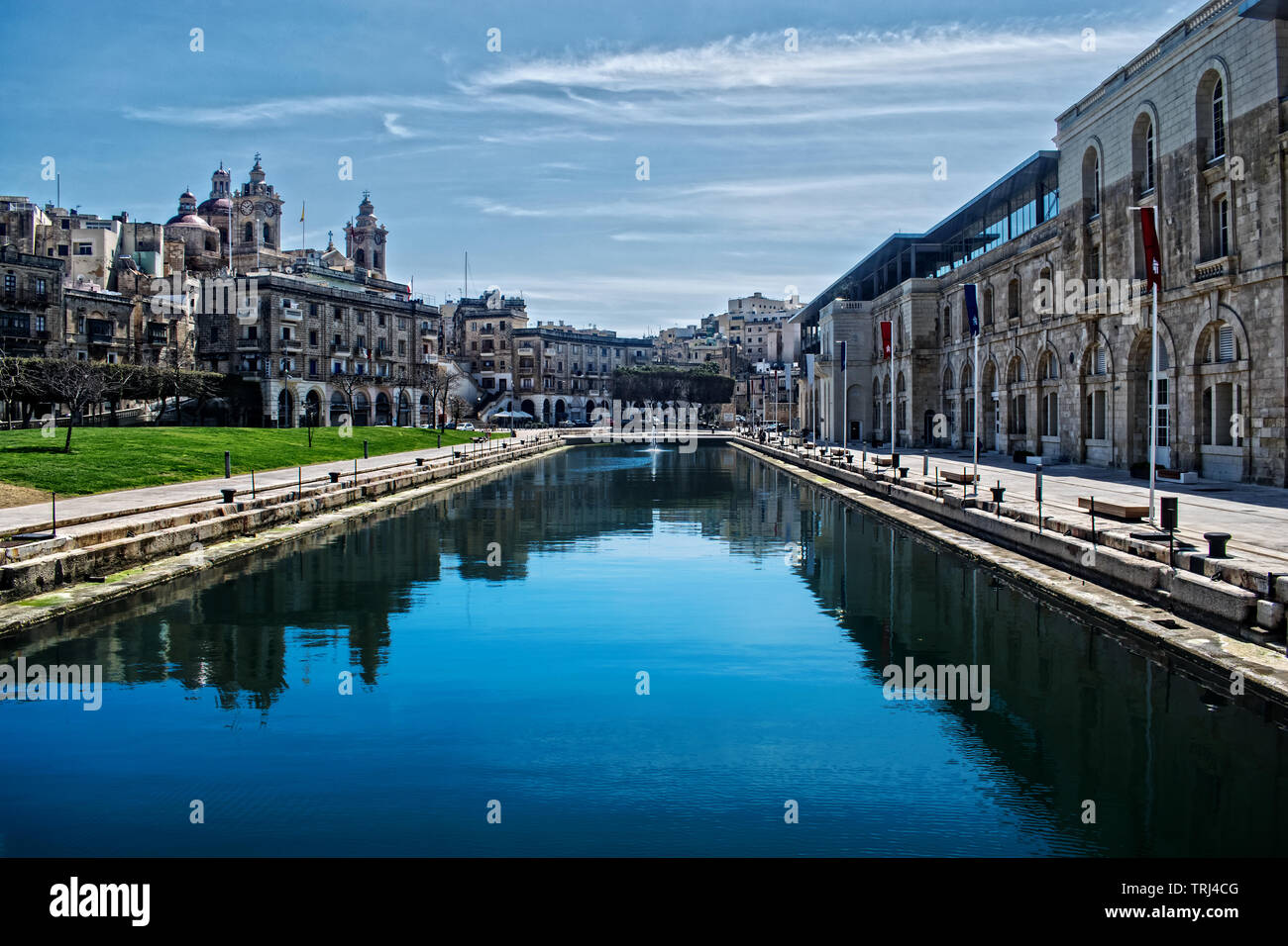 A Dock in Cospicua, Malta. A Dock surrounded by old and modern ...