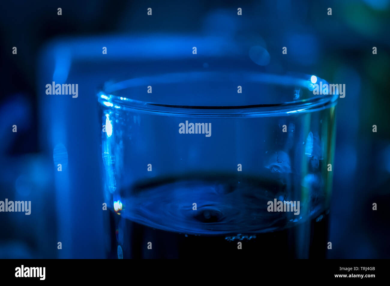 A glass of unknown substance Stock Photo - Alamy