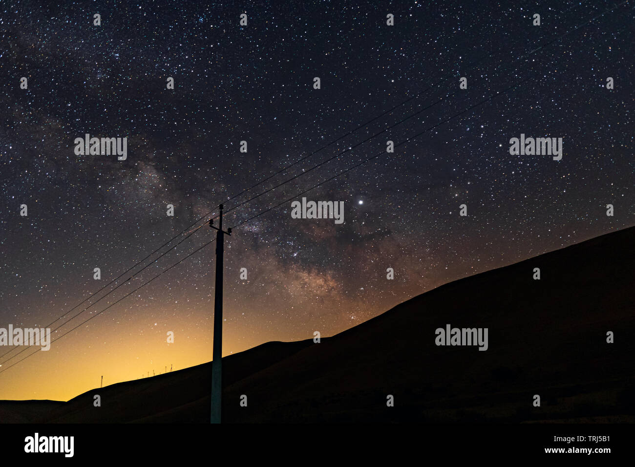 Power line against the night starry sky Stock Photo - Alamy