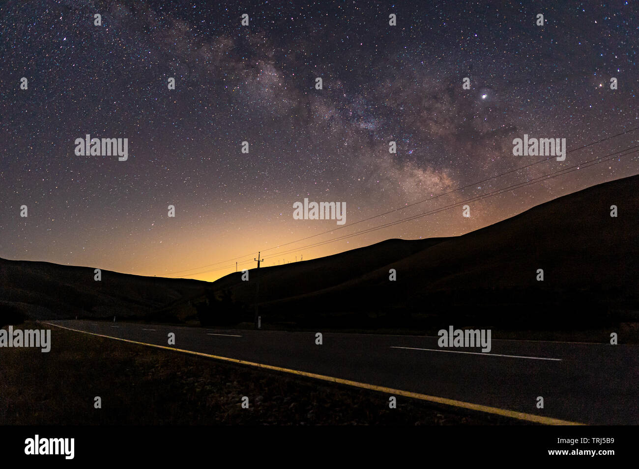 Empty road at night time Stock Photo - Alamy