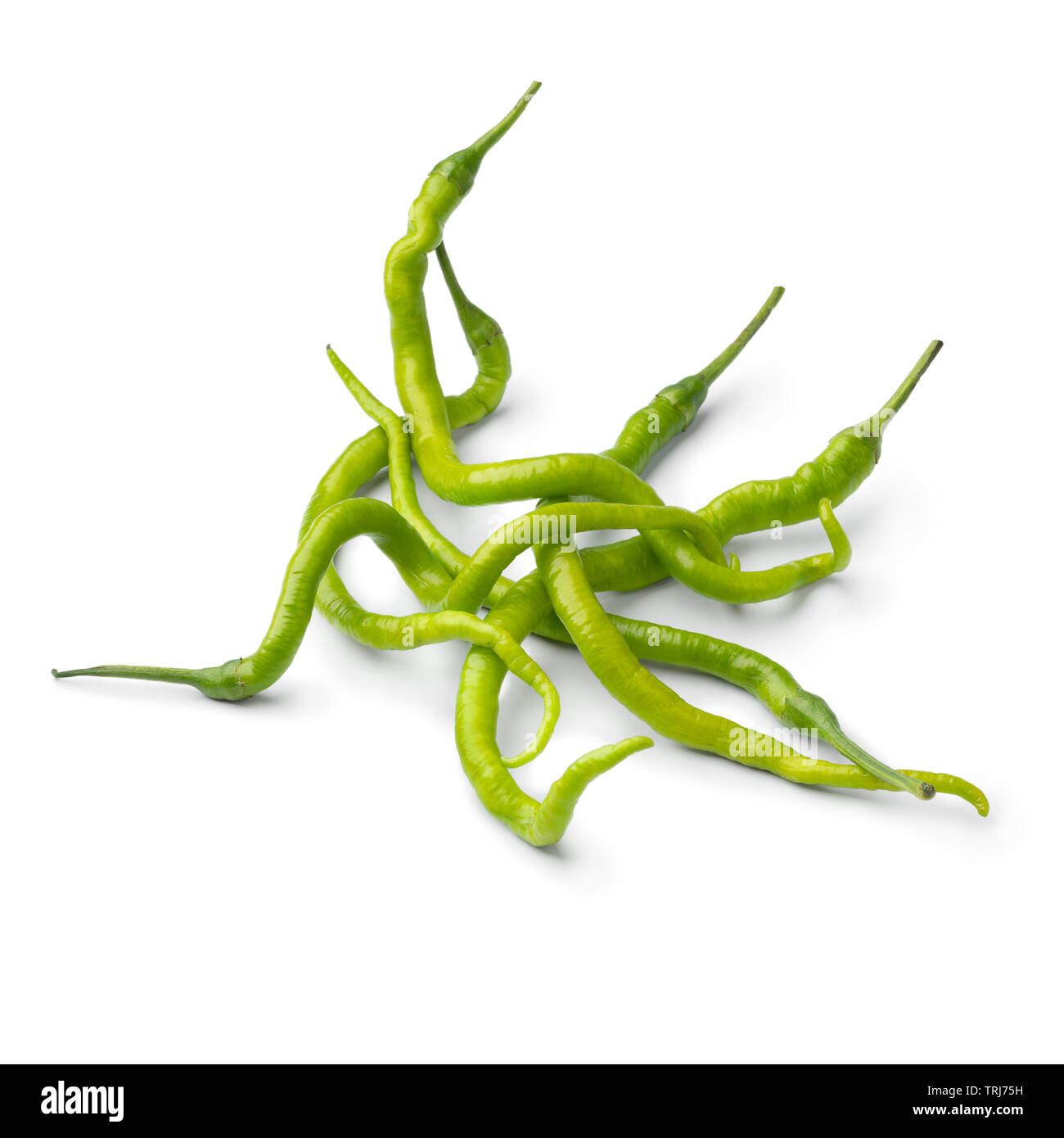 Heap of fresh green sweet Turkish peppers isolated on white background ...
