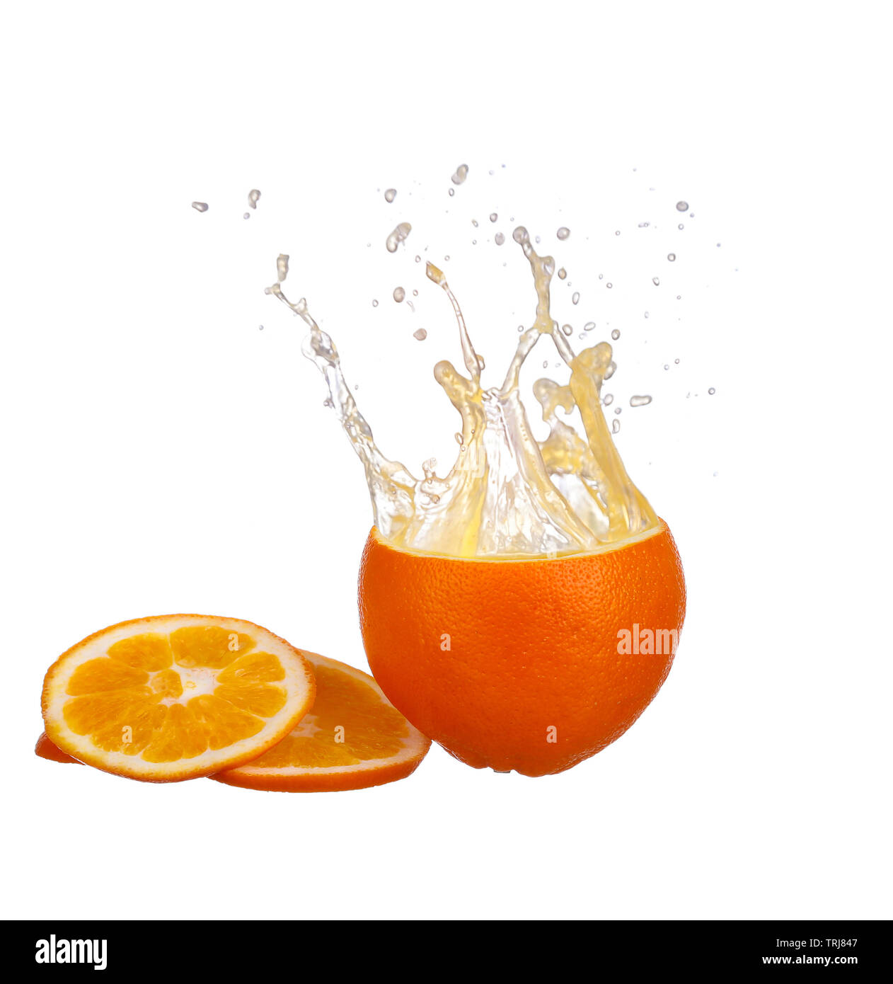Orange juice splashing isolated on white Stock Photo - Alamy