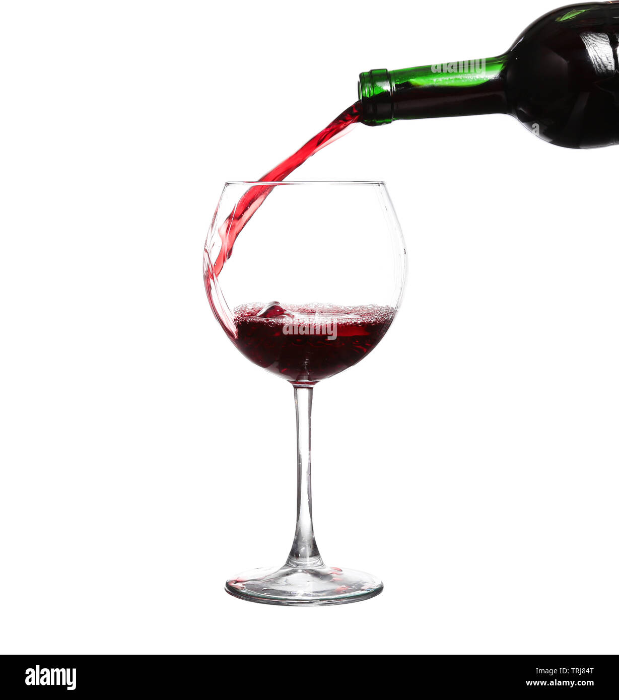 Red wine pouring on white background Stock Photo - Alamy