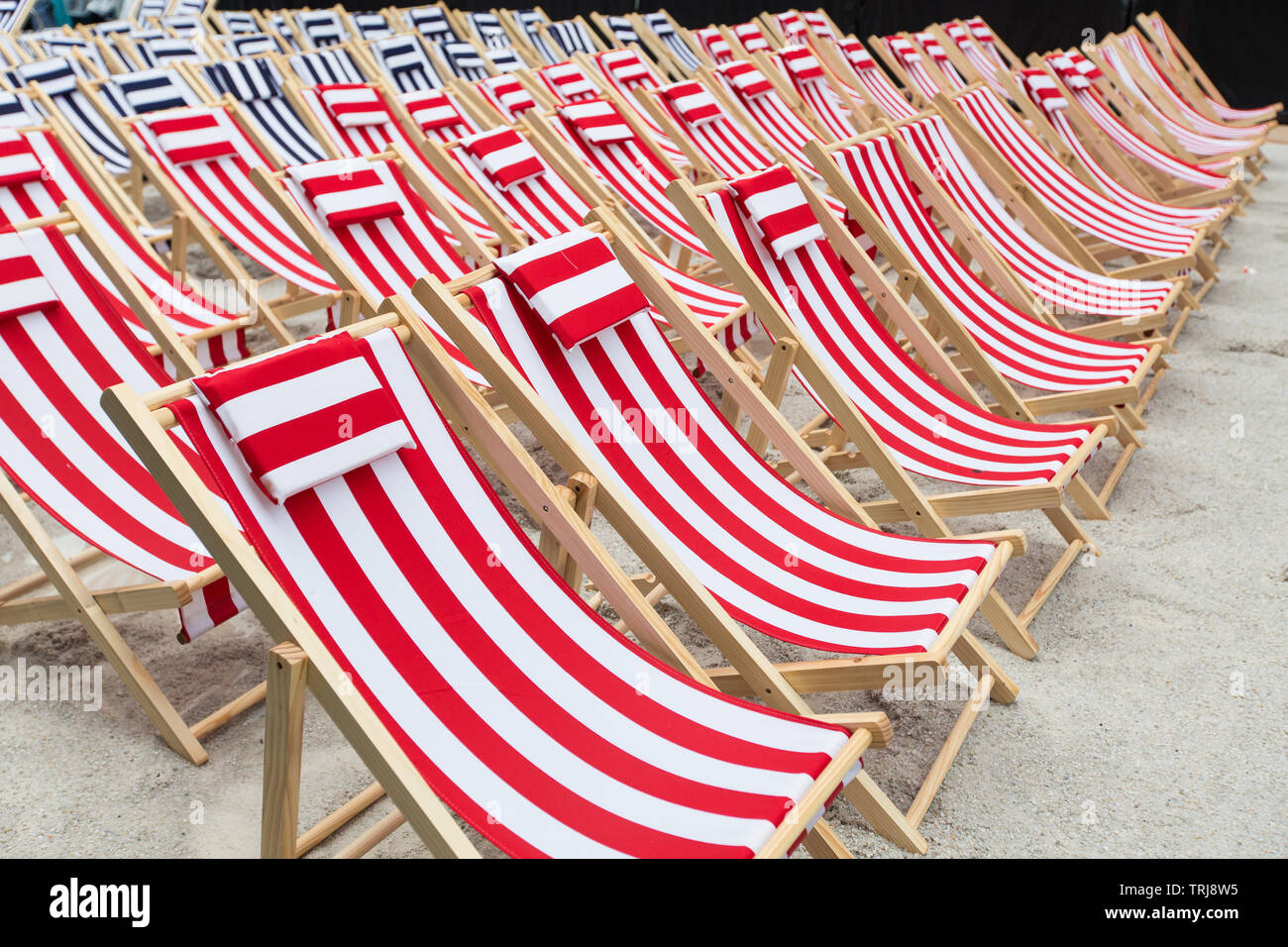 Red wooden outdoor chairs hi-res stock photography and images - Alamy
