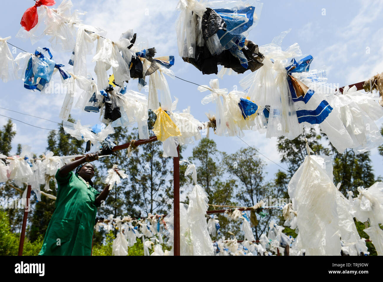 RWANDA, Kigali, plastic recycling at company ecoplastics, worker clean ...