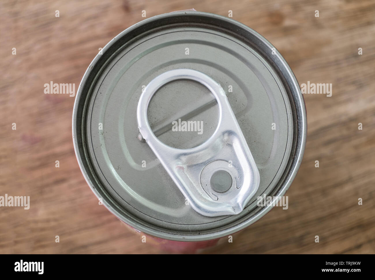 Tin can lid close on top view Stock Photo - Alamy
