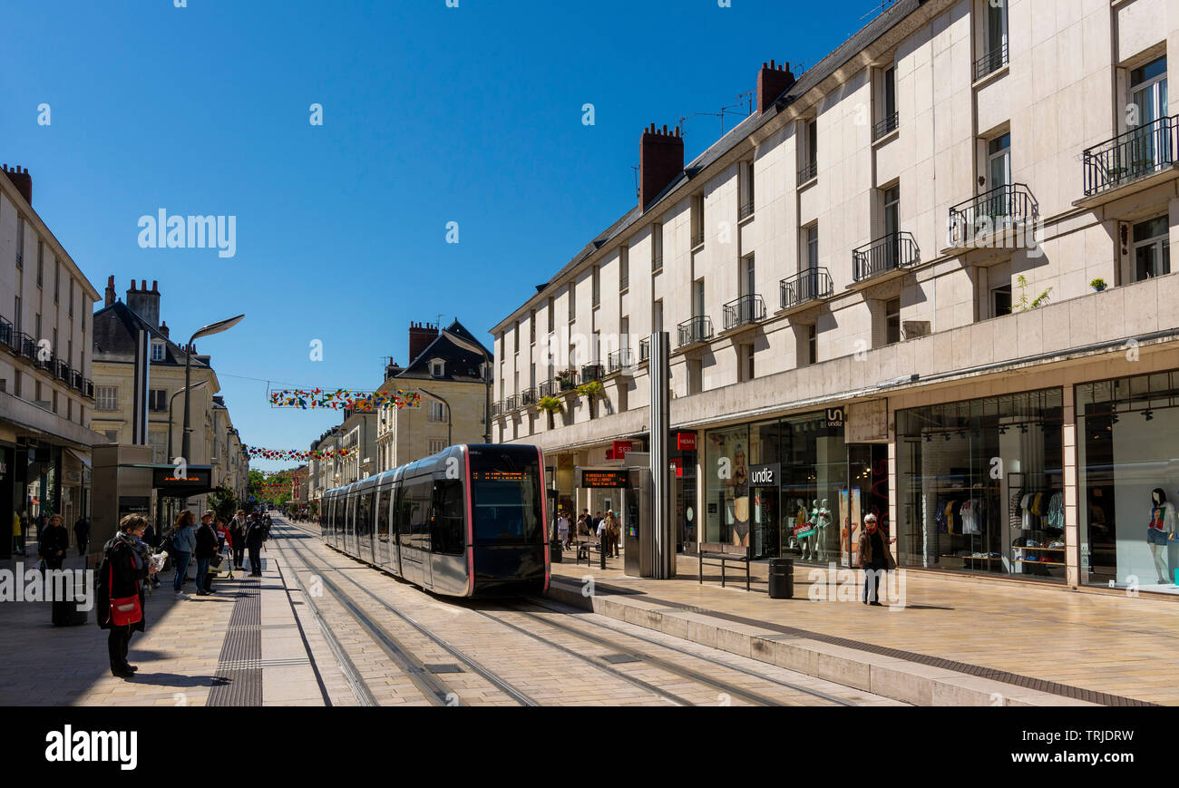 Modern tramway in Tours city centre, shopping street (Rue Nationale) in ...