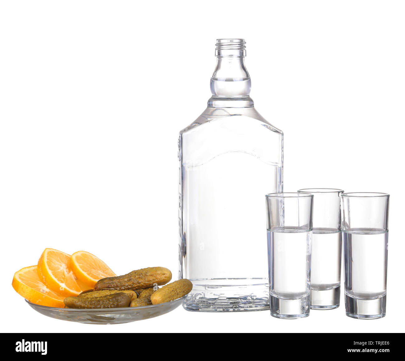 blank label vodka glass and lemon on white background Stock Photo - Alamy