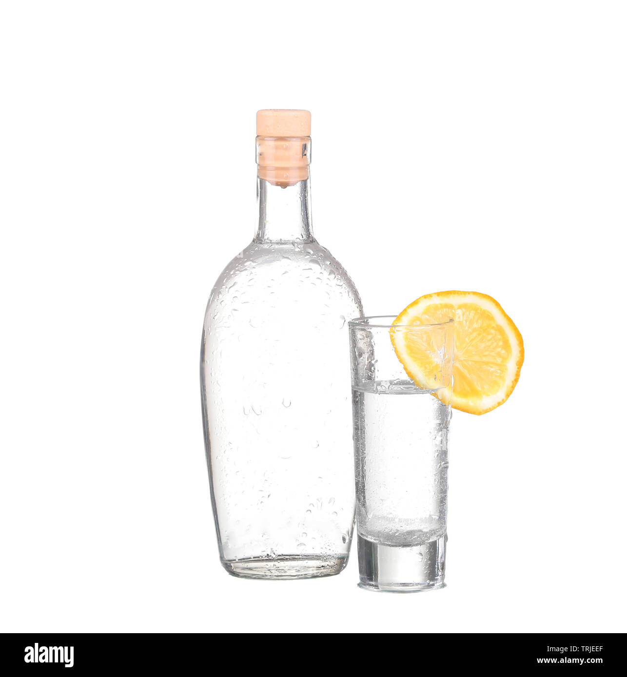 blank label vodka glass and lemon on white background Stock Photo - Alamy