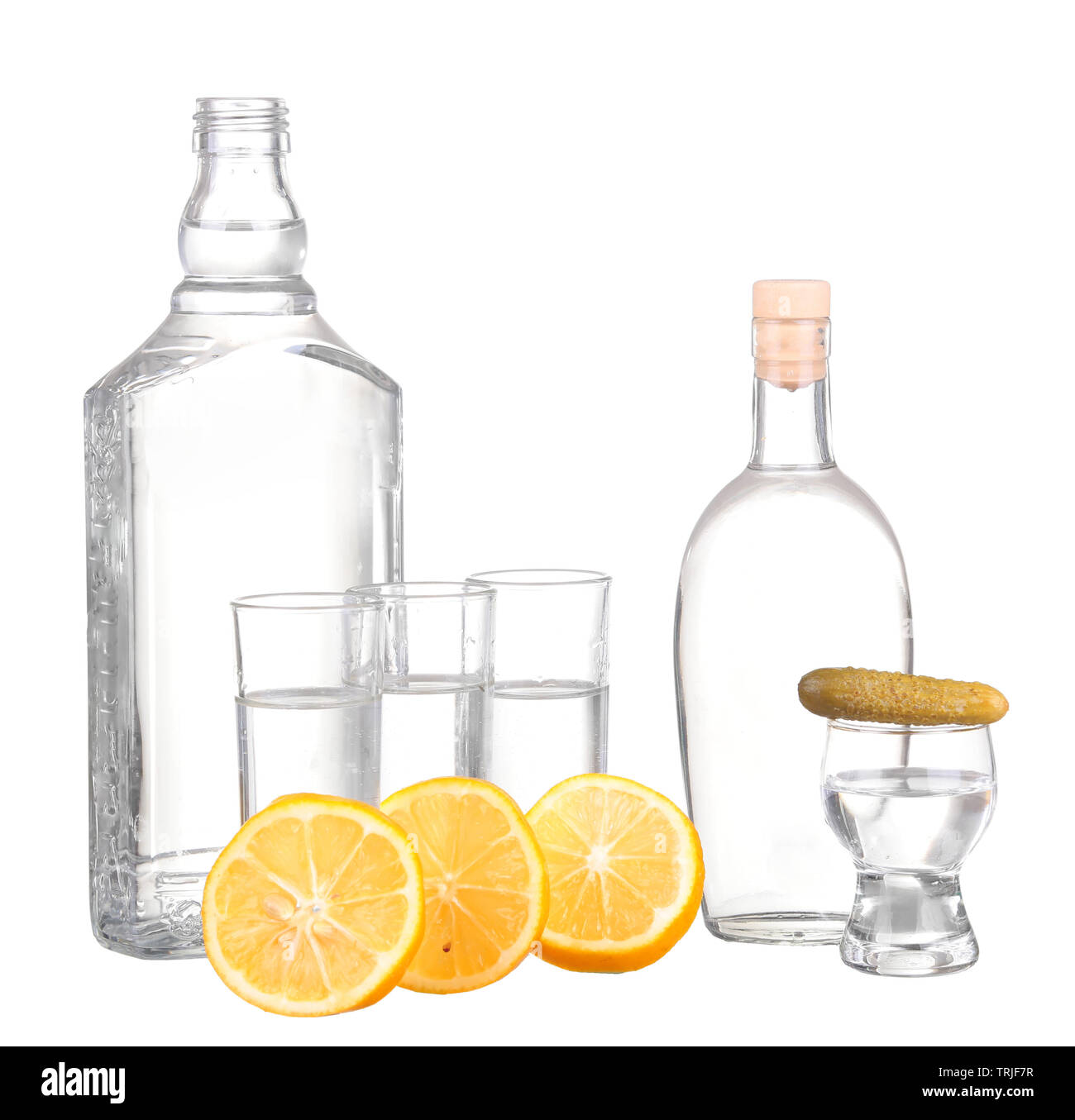 blank label vodka glass and lemon on white background Stock Photo - Alamy