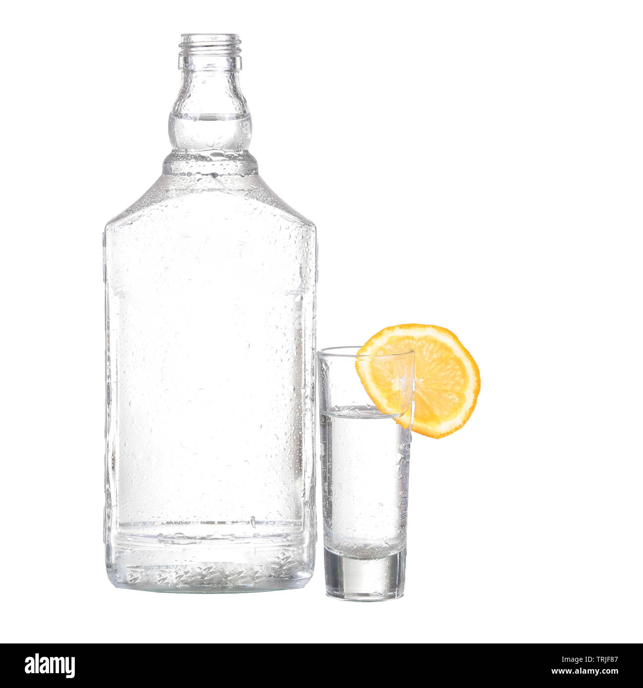blank label vodka glass and lemon on white background Stock Photo - Alamy