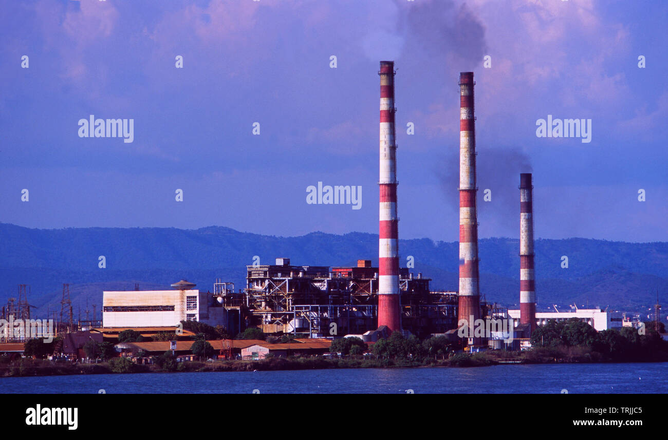 Cuba: Oil Raffinery at the Port of Santiago de Cuba Stock Photo - Alamy