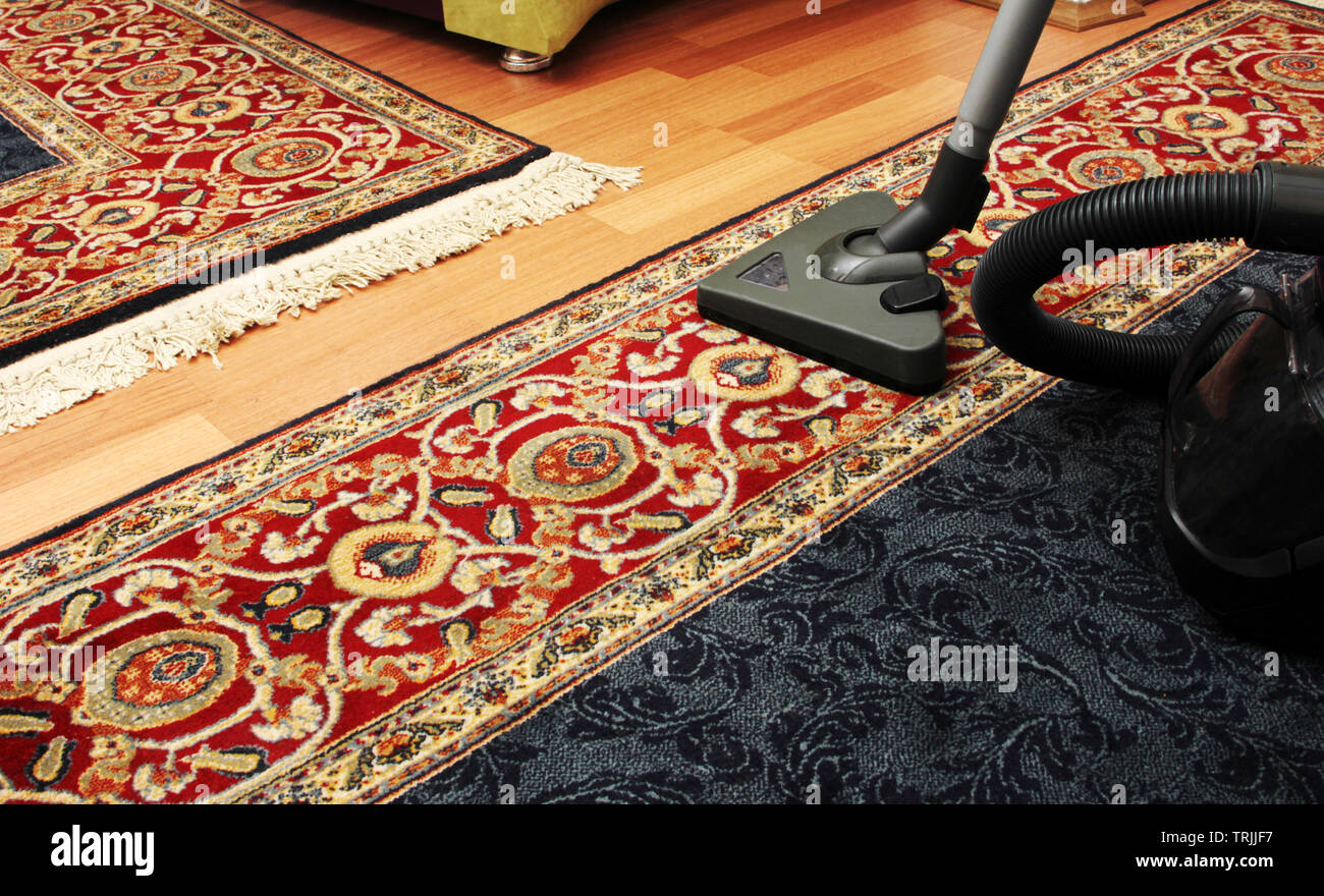 House cleaning with vacuum cleaner Stock Photo - Alamy