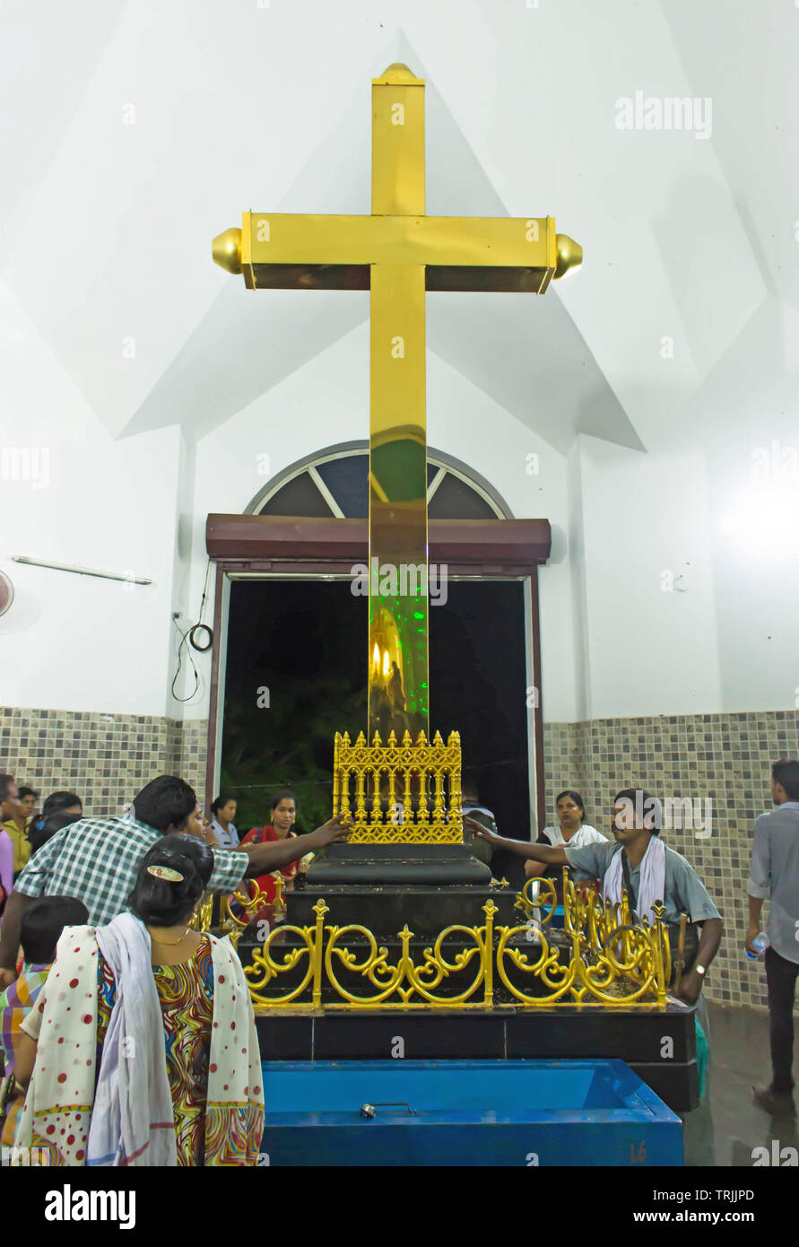 Malayattor, Kerala, India - April 3, 2016: Peoples touching and praying ...