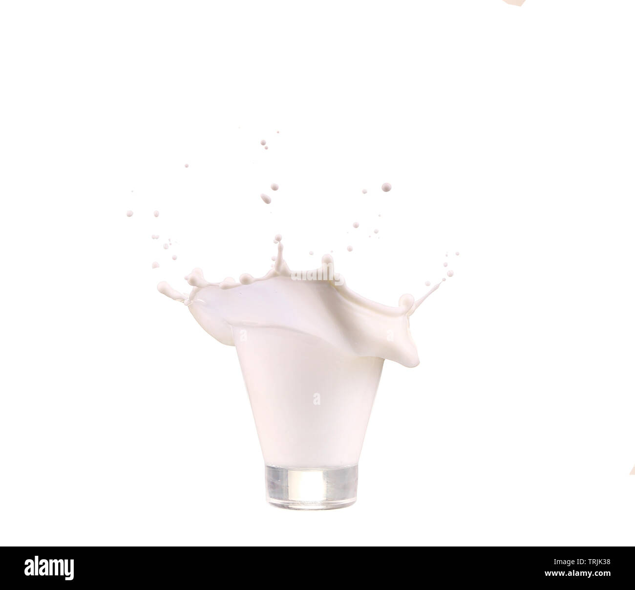 Milk splash in cup Cut Out Stock Images & Pictures - Alamy
