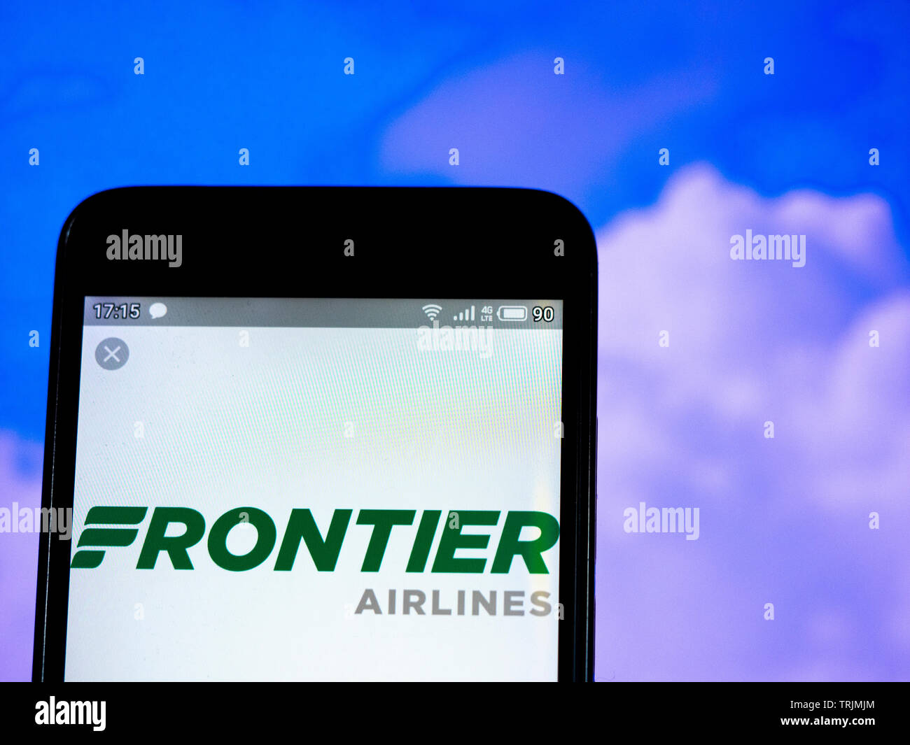 In this photo illustration the Frontier Airlines logo is seen displayed ...