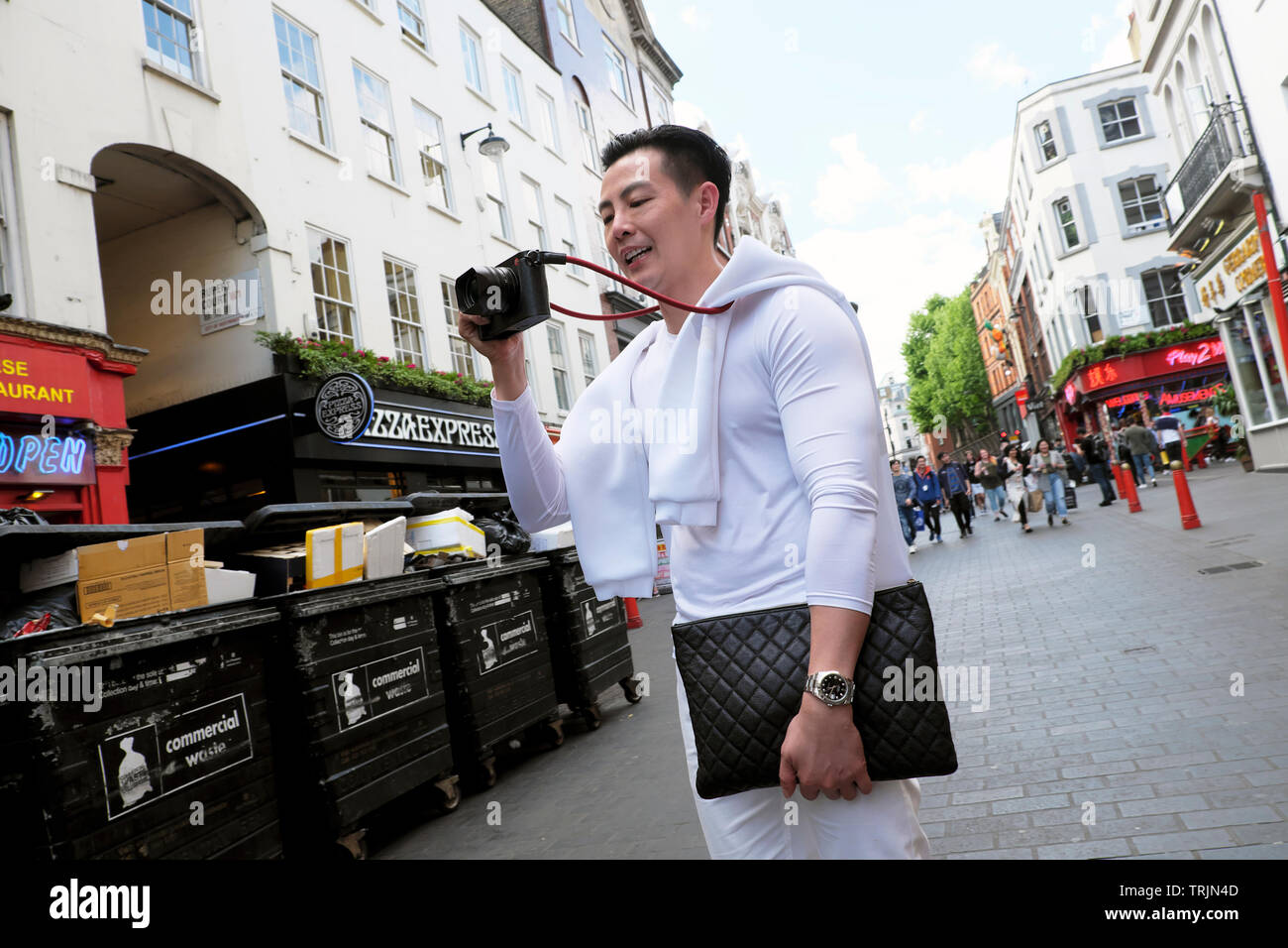 Young chinese man standing outside hi-res stock photography and images ...