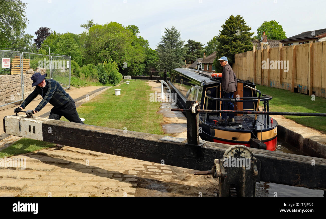 Lady controlling a narrow boat hi-res stock photography and images - Alamy