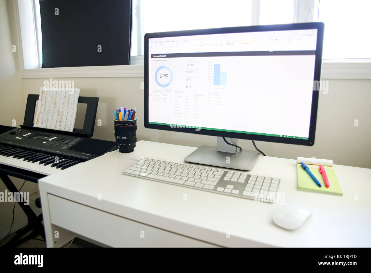 Cozy and Lighter Home Office with a Computer and Piano Keyboard Stock ...