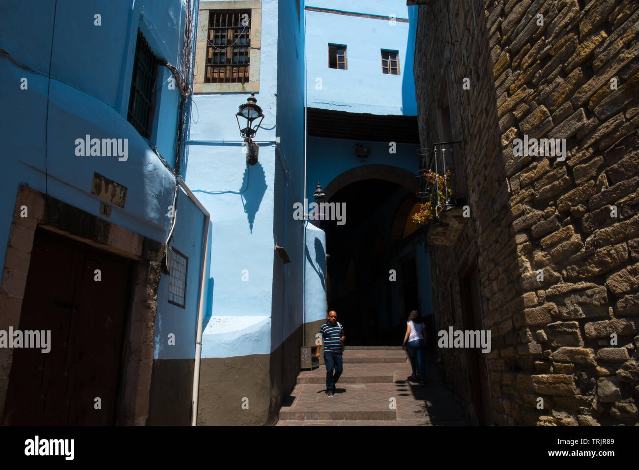 Blue walls and an archway in the historic city center of Guanajuato ...