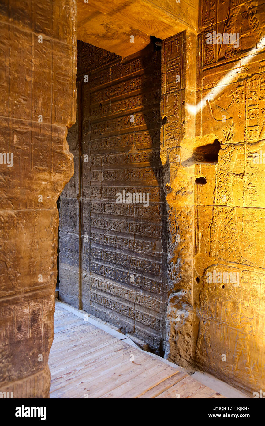 Wall decorations and hieroglyphics of the gods Ra, Osiris and Horus in ...