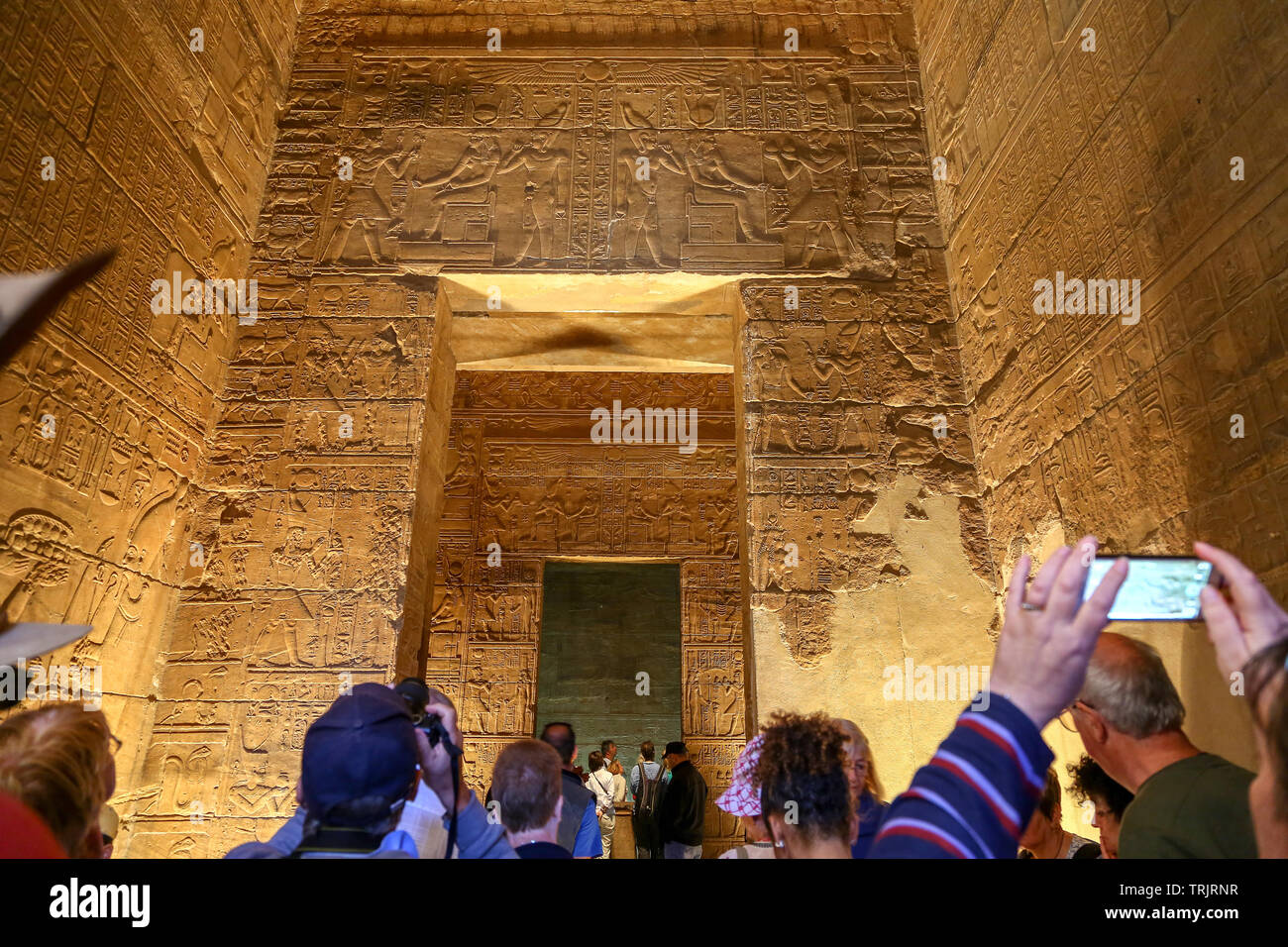 Wall decorations and hieroglyphics of the gods Ra, Osiris and Horus in ...