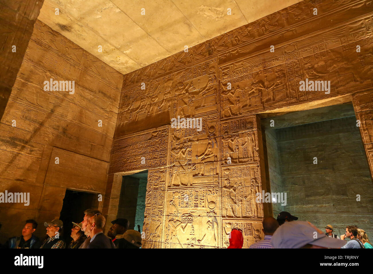 Wall decorations and hieroglyphics of the gods Ra, Osiris and Horus in ...