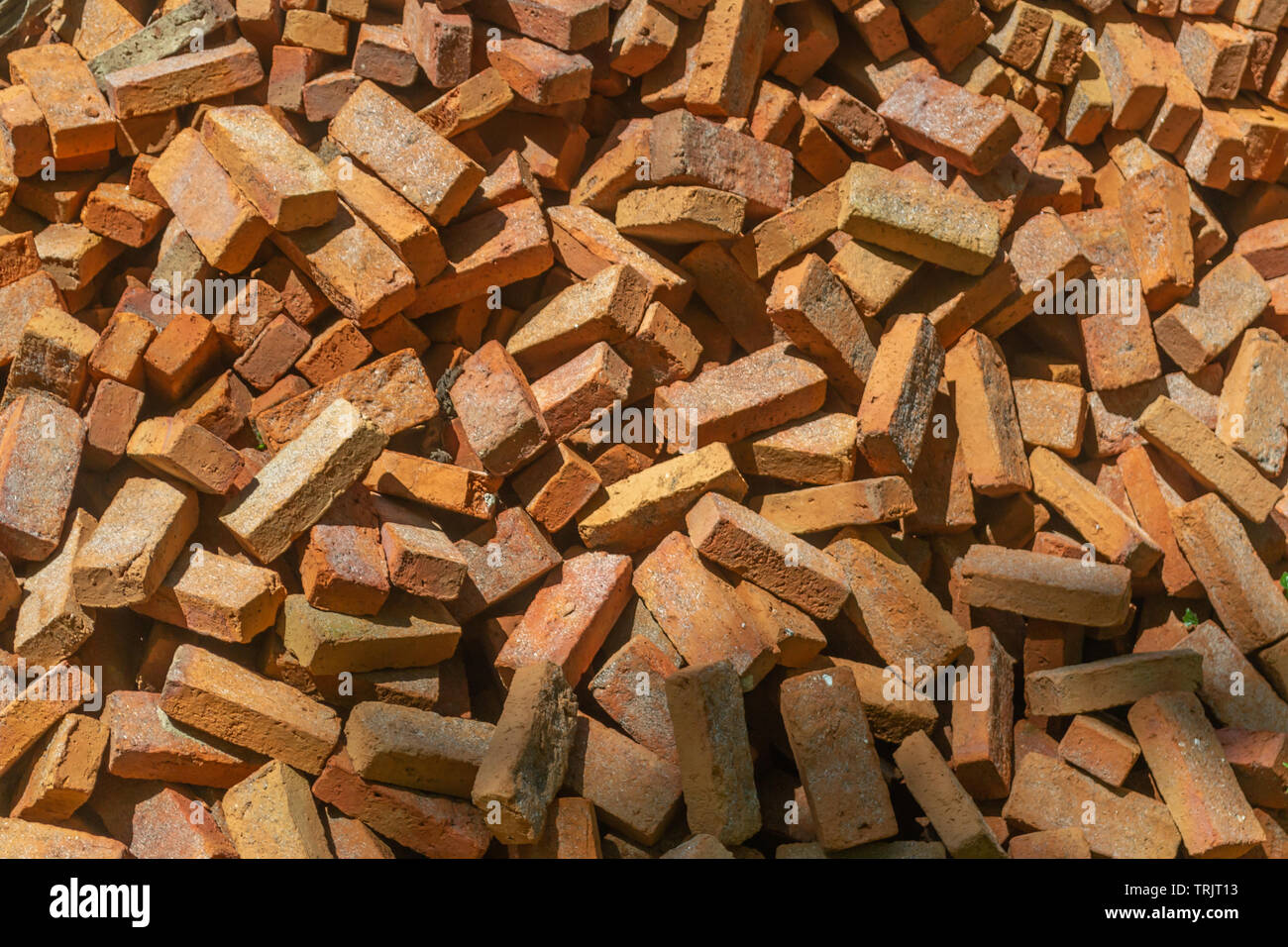 Pile yellow house brick hi-res stock photography and images - Alamy