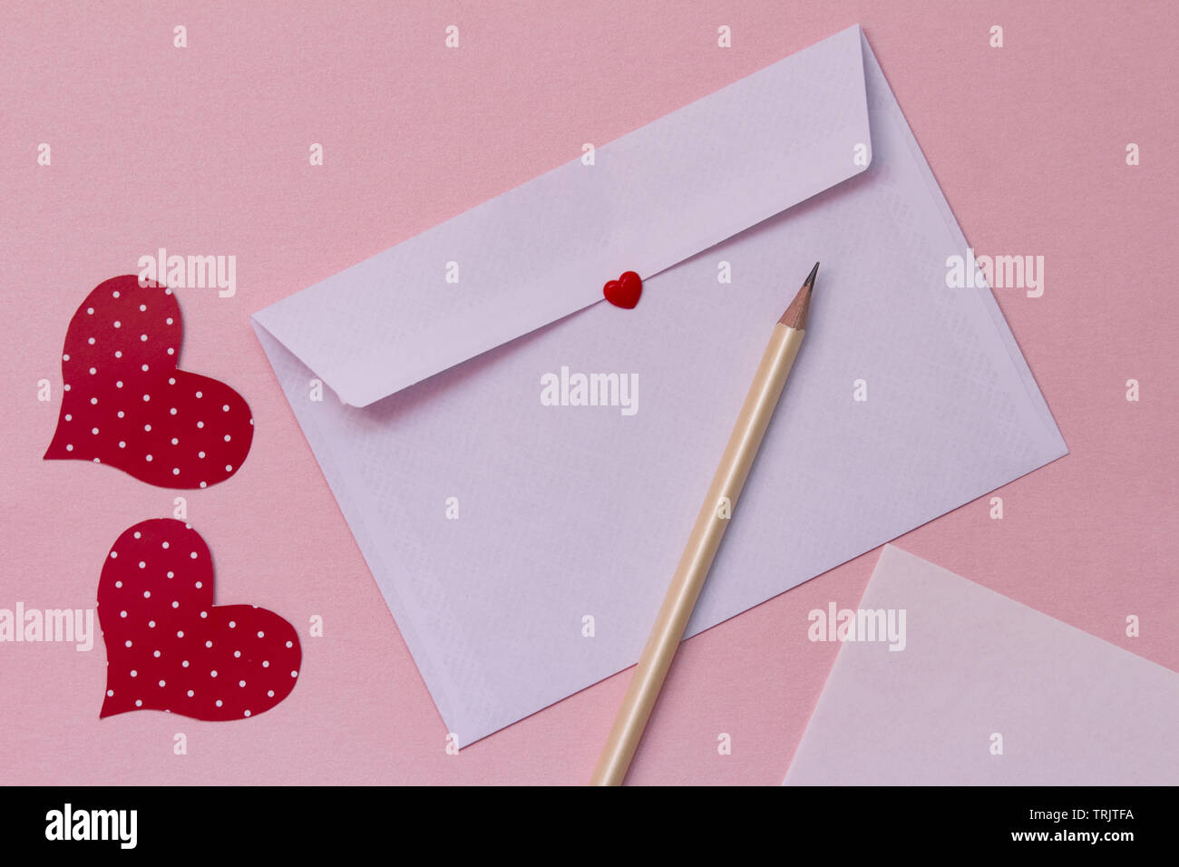 Love letter on a pink background. white paper envelope mock up. love ...