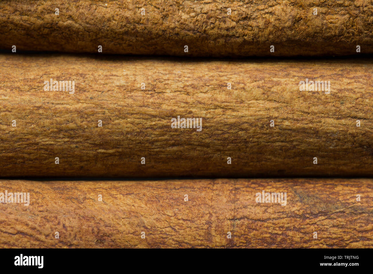 organic cinnamon sticks as background Stock Photo - Alamy